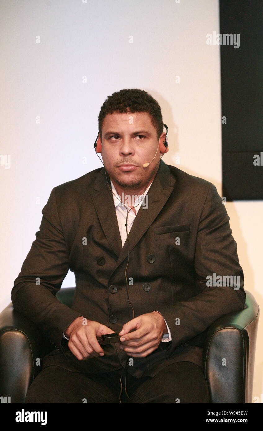 Retired Brazilian football superstar Ronaldo attends a press conference ...