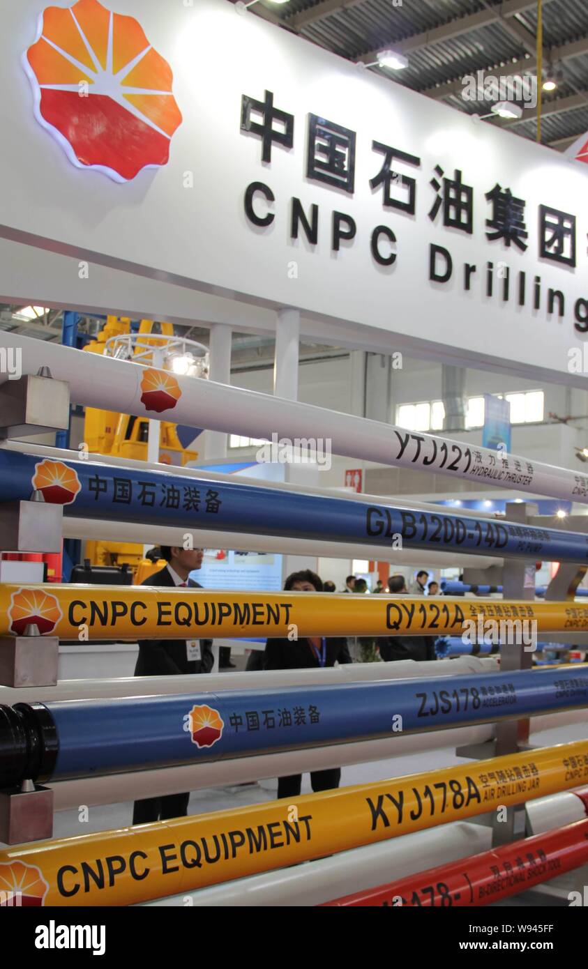 --FILE--Visitors look at CNPC drilling equipments at the stand of CNPC ...