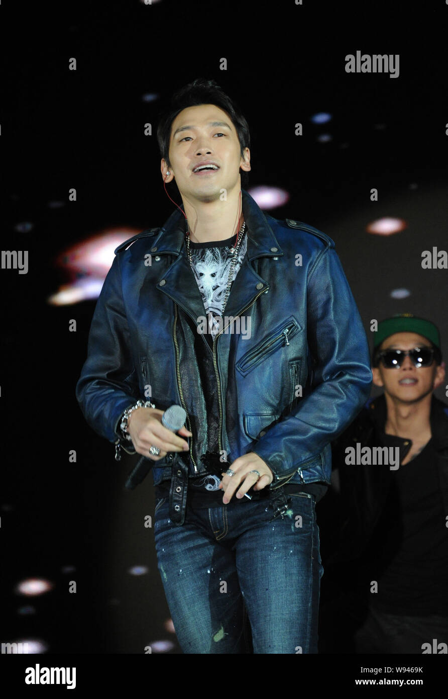 South Korean singer and actor Jeong Ji-hoon, front, better known by his ...