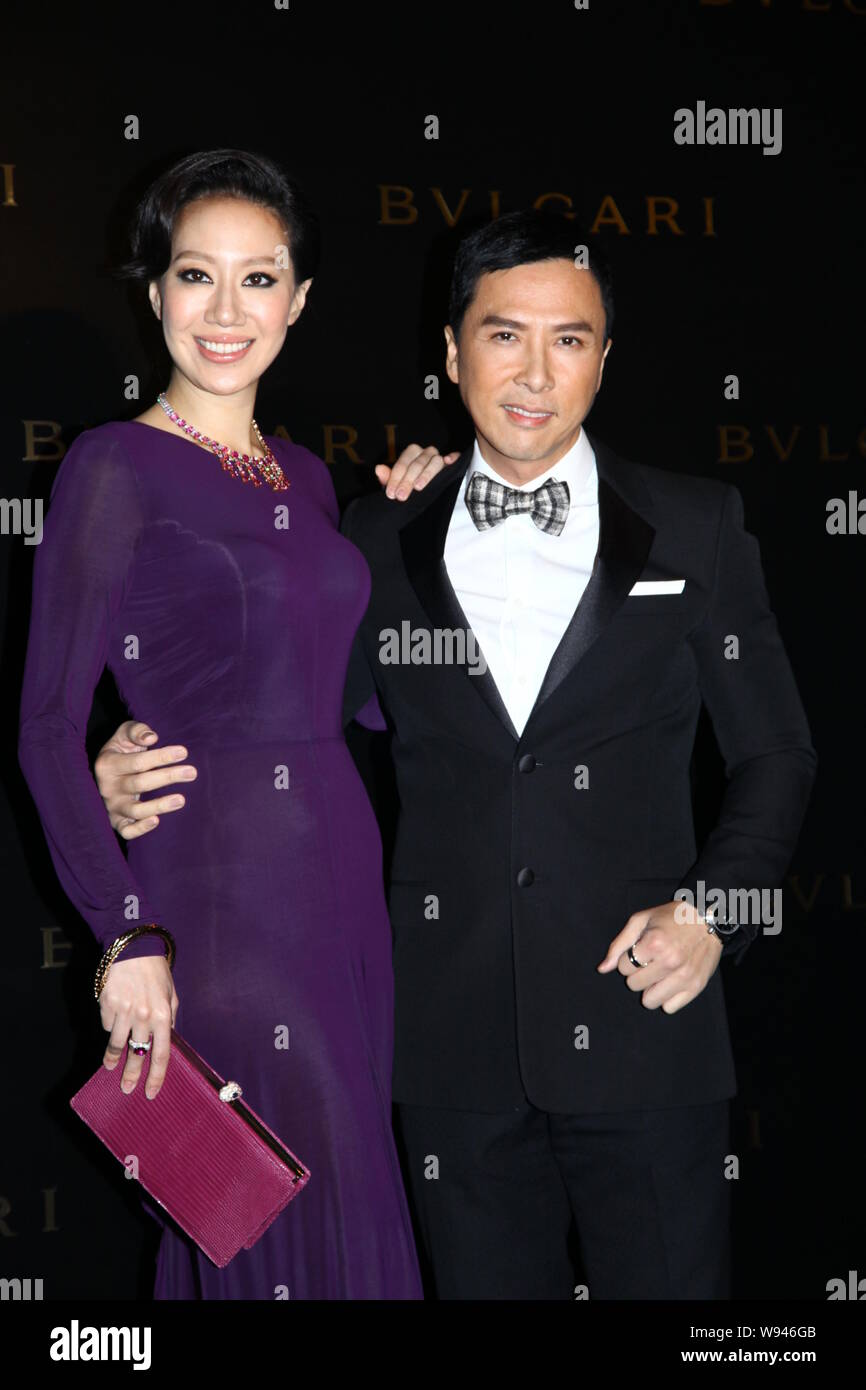 Hong Kong actor Donnie Yen, right, and his model wife Cecilia Wang pose as they arrive for a ...