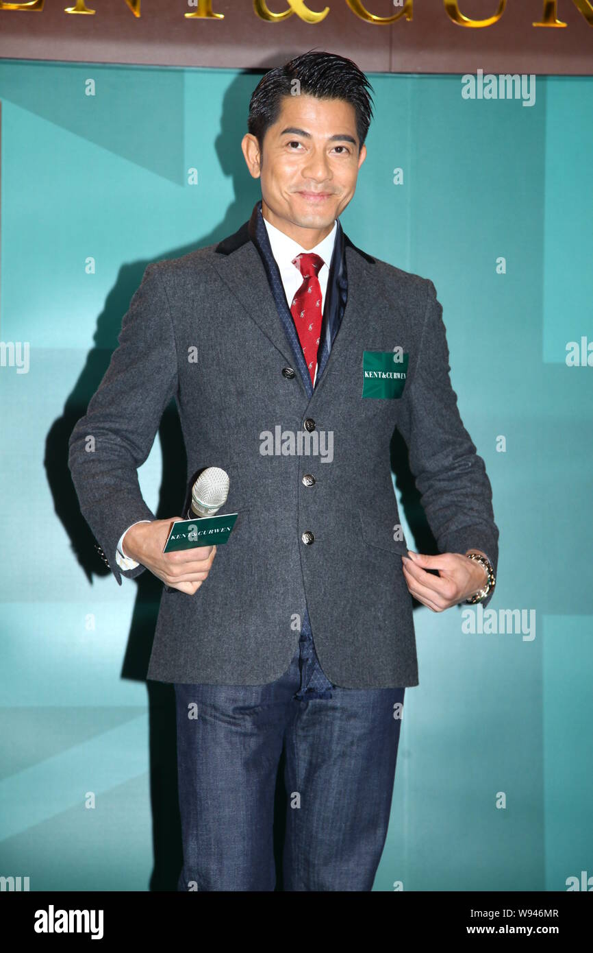 Hong Kong singer and actor Aaron Kwok poses at an opening ceremony of ...