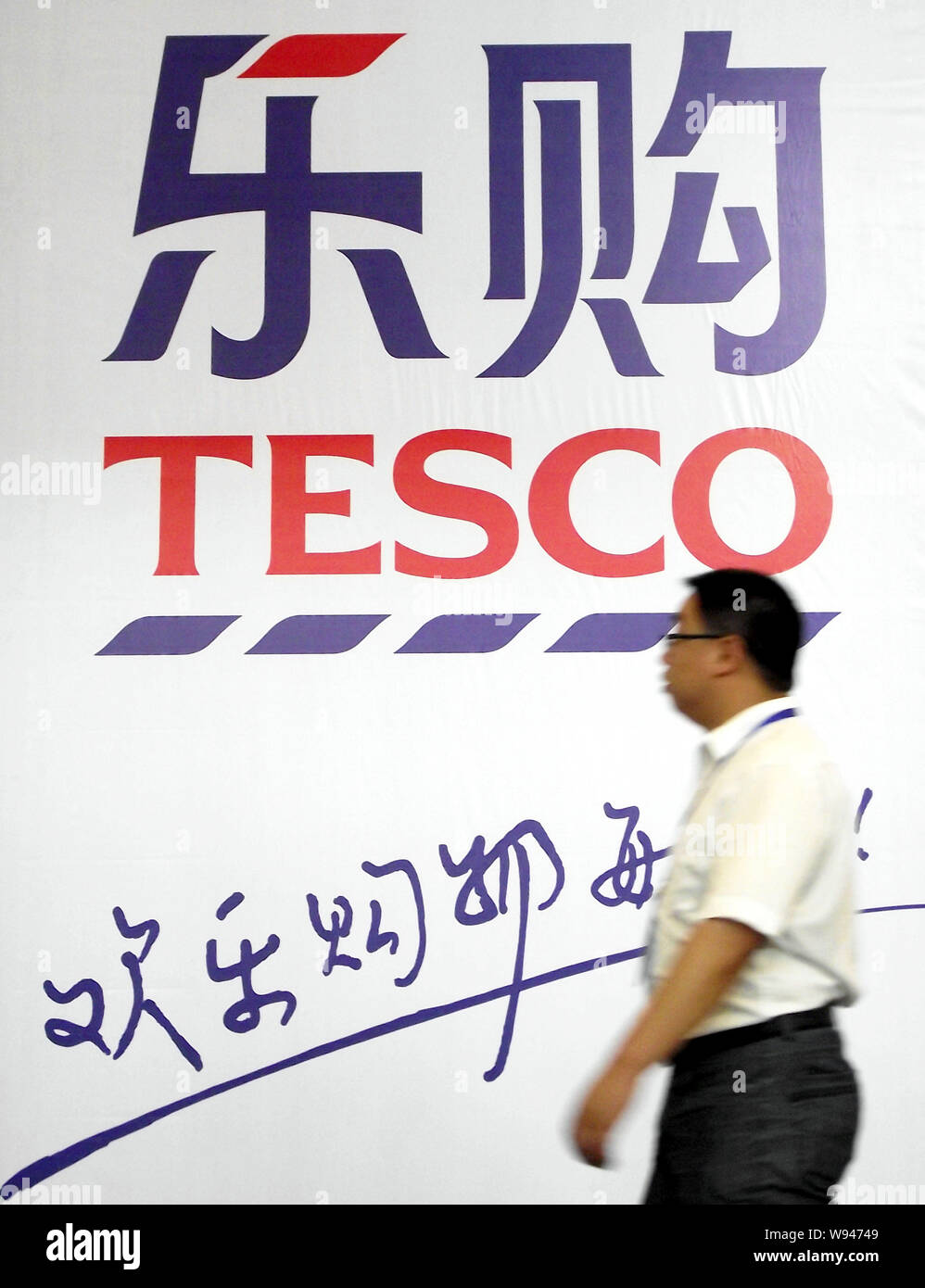 Tesco Supermarket Employee High Resolution Stock Photography and Images ...