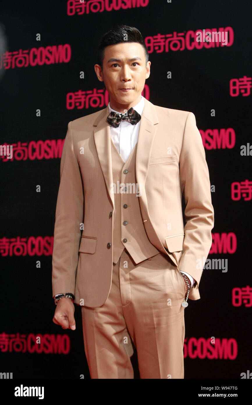 Chinese actor Lu Yi poses on the red carpet as he arrives at the 2013 ...