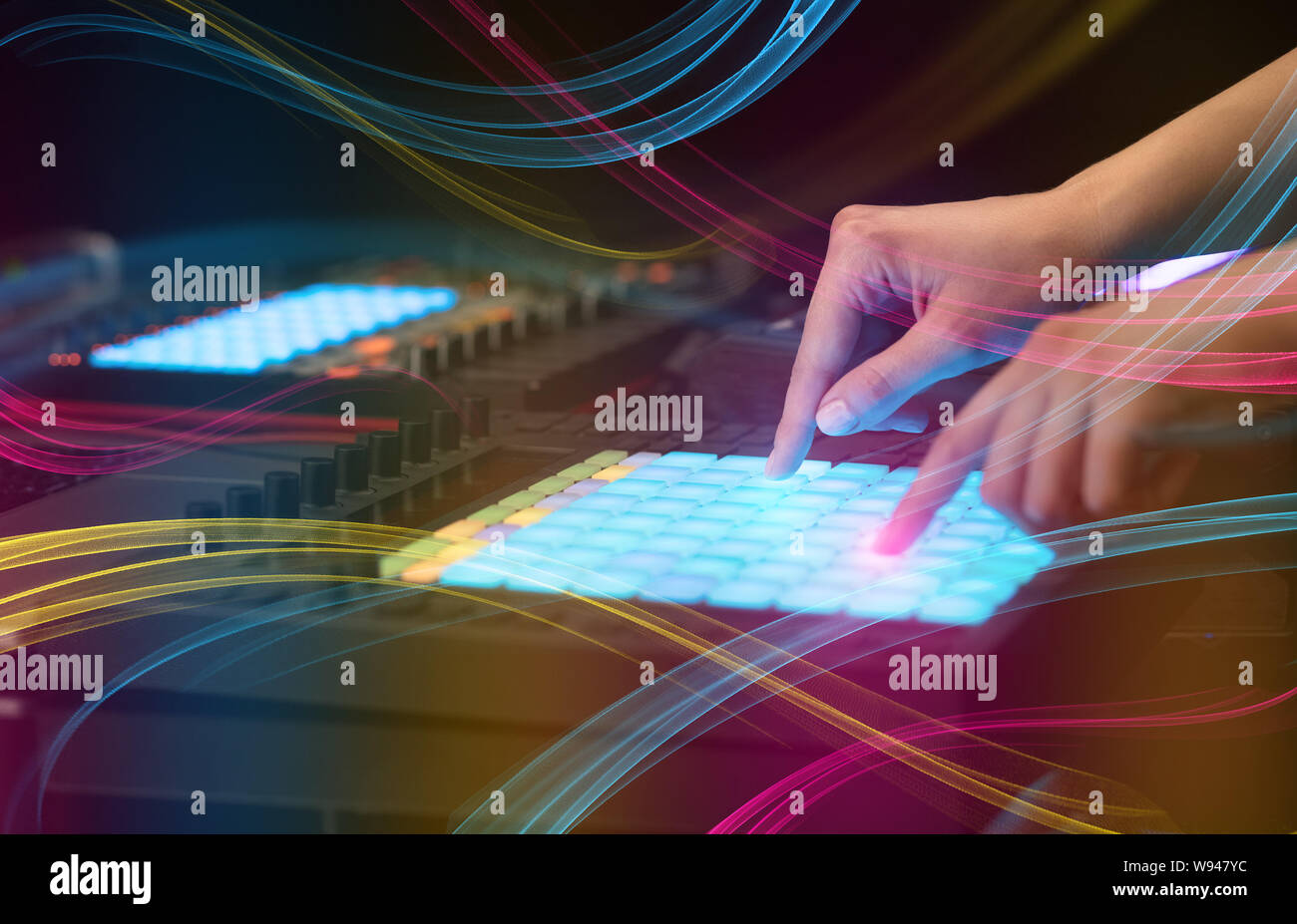 Hand mixing music on midi controller with colorful vibe concept Stock ...