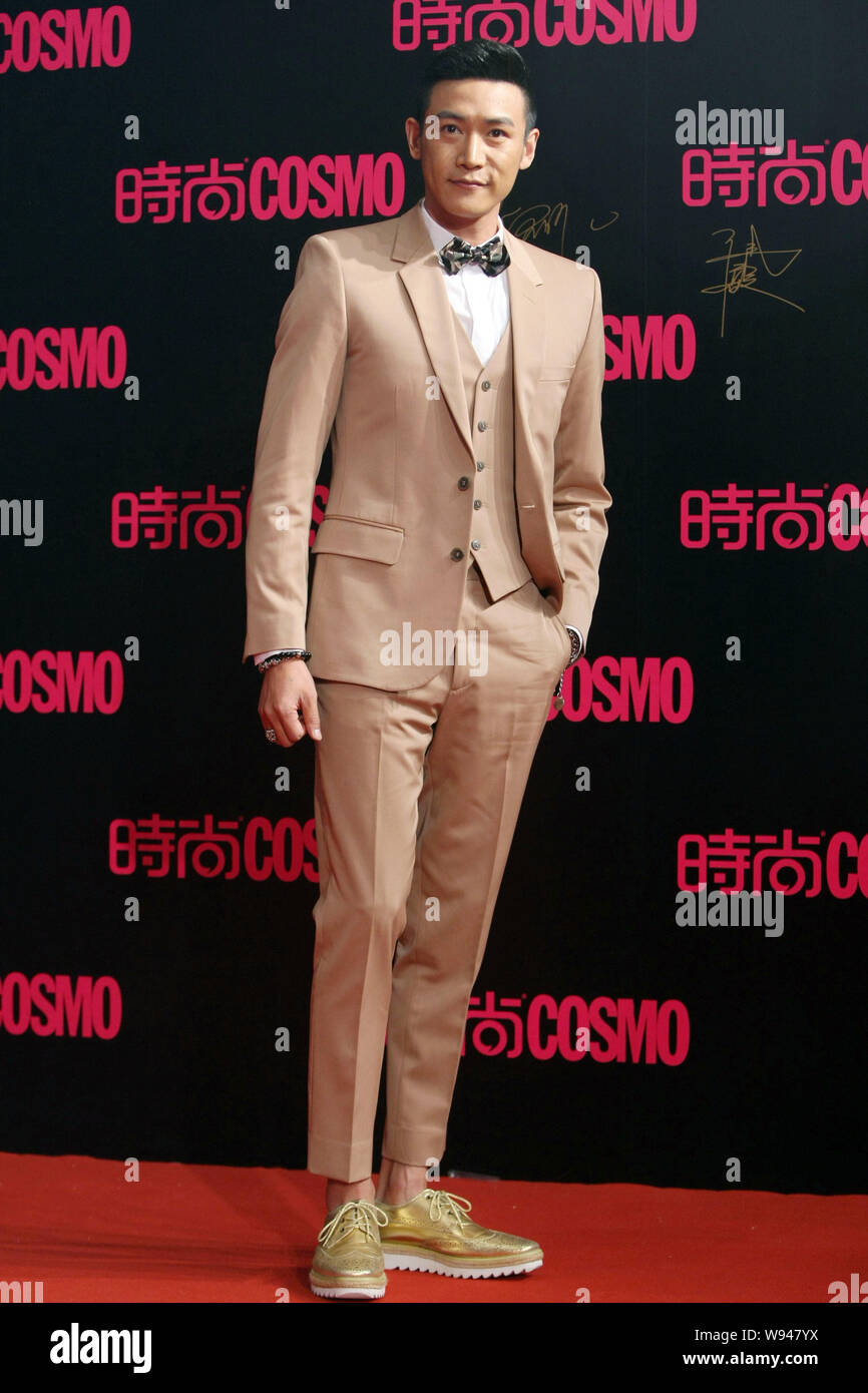 Chinese actor Lu Yi poses on the red carpet as he arrives at the 2013 ...