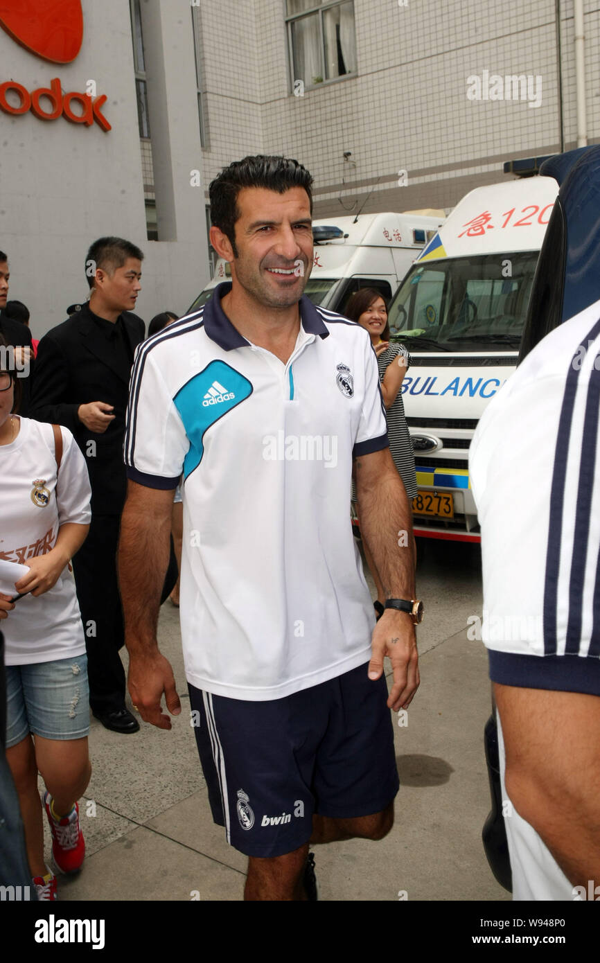 Portuguese football star Luis Figo of Real Madrid Leyendas smiles as he ...