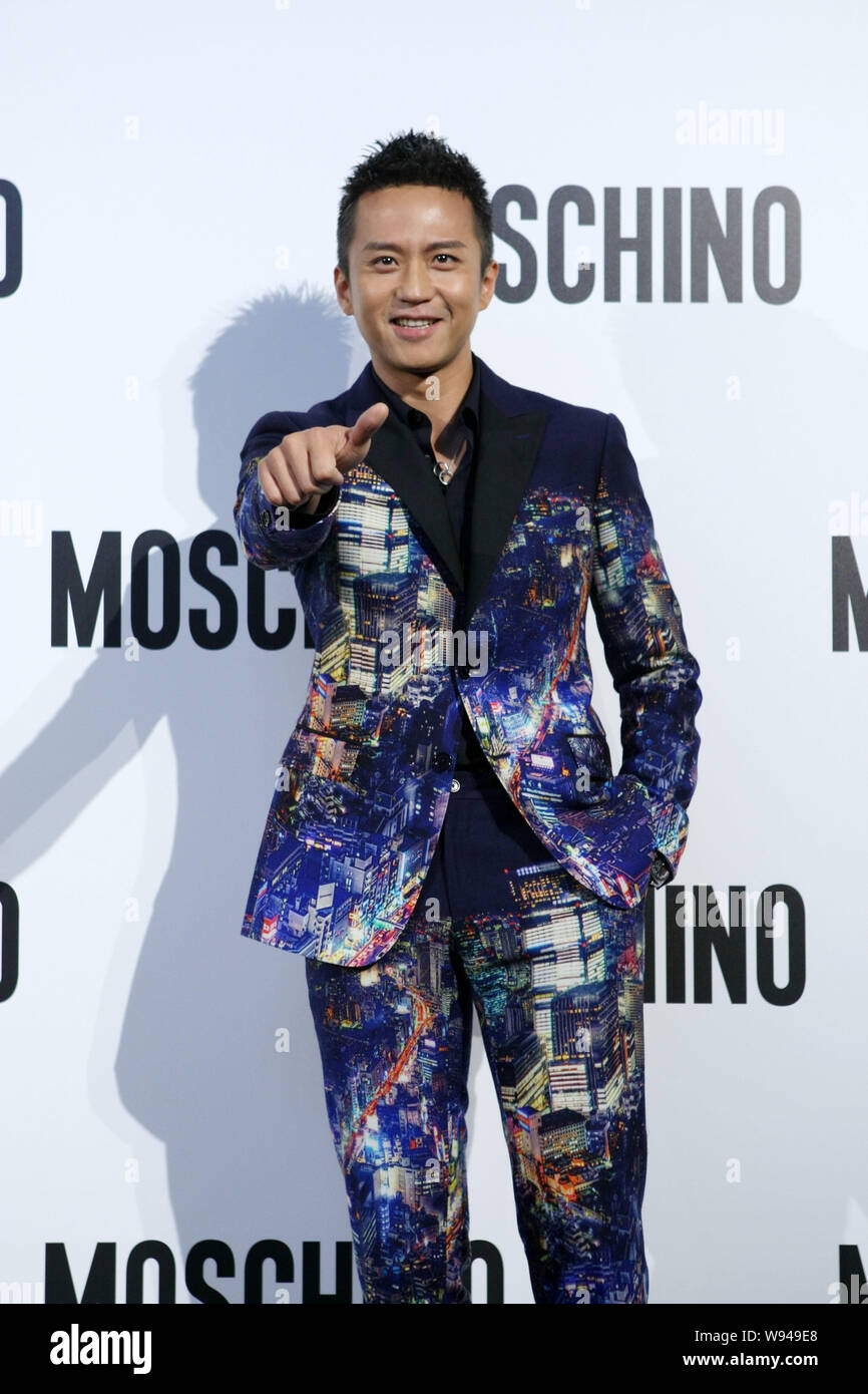 Chinese actor Deng Chao poses as he arrives for the Moschino 2013 ...