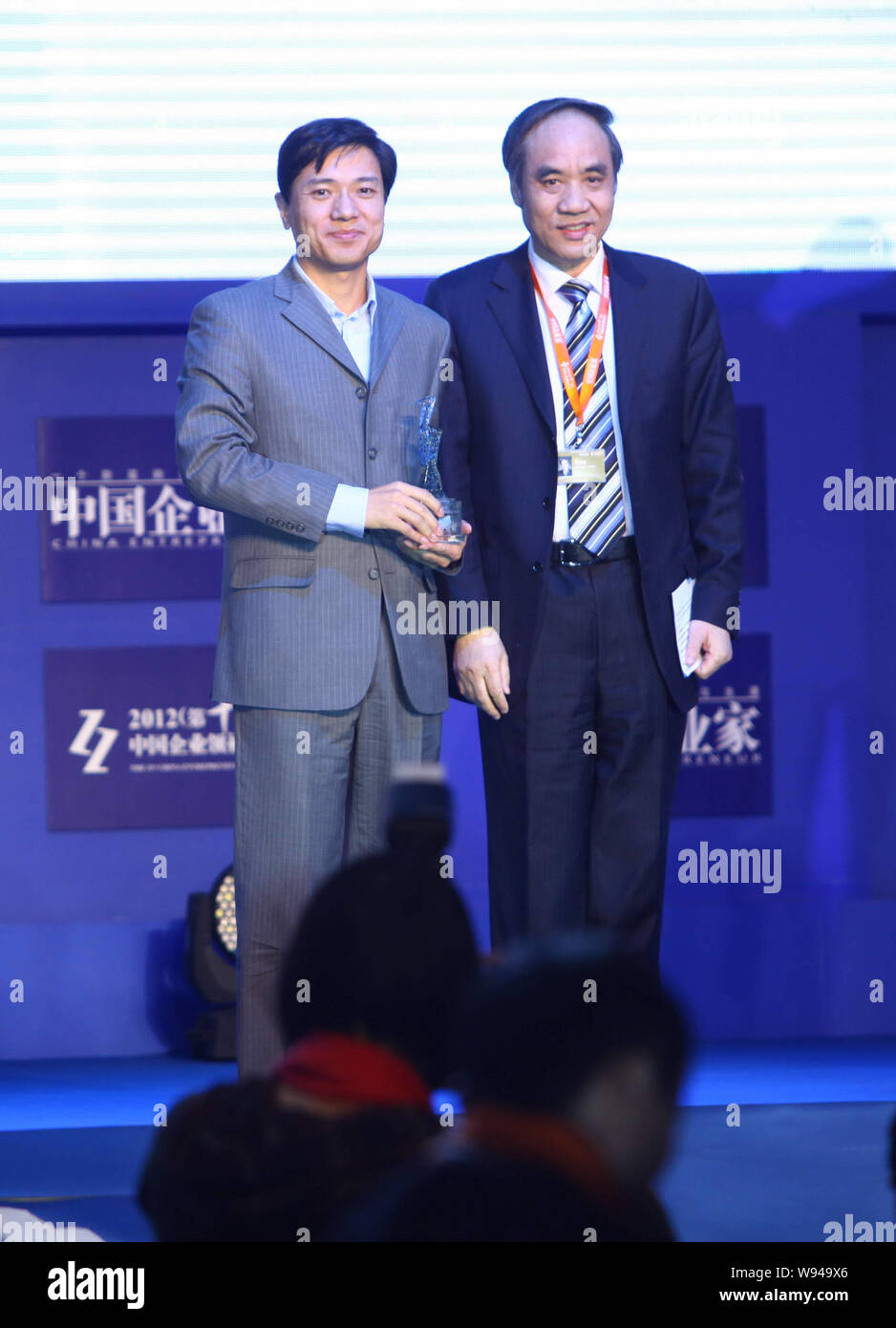 --FILE--Robin Li Yanhong, left, Chairman and CEO of Baidu, poses with ...
