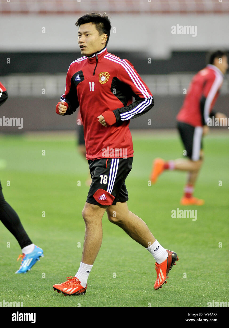 Gao Lin and his teammates of the Chinese national football team take ...