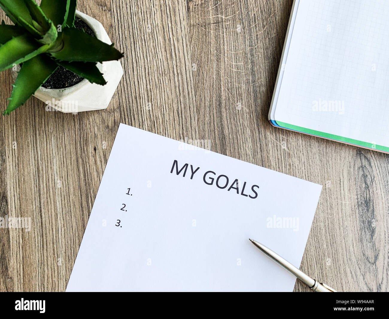 Clipboard with my goals on wood desk Stock Photo - Alamy