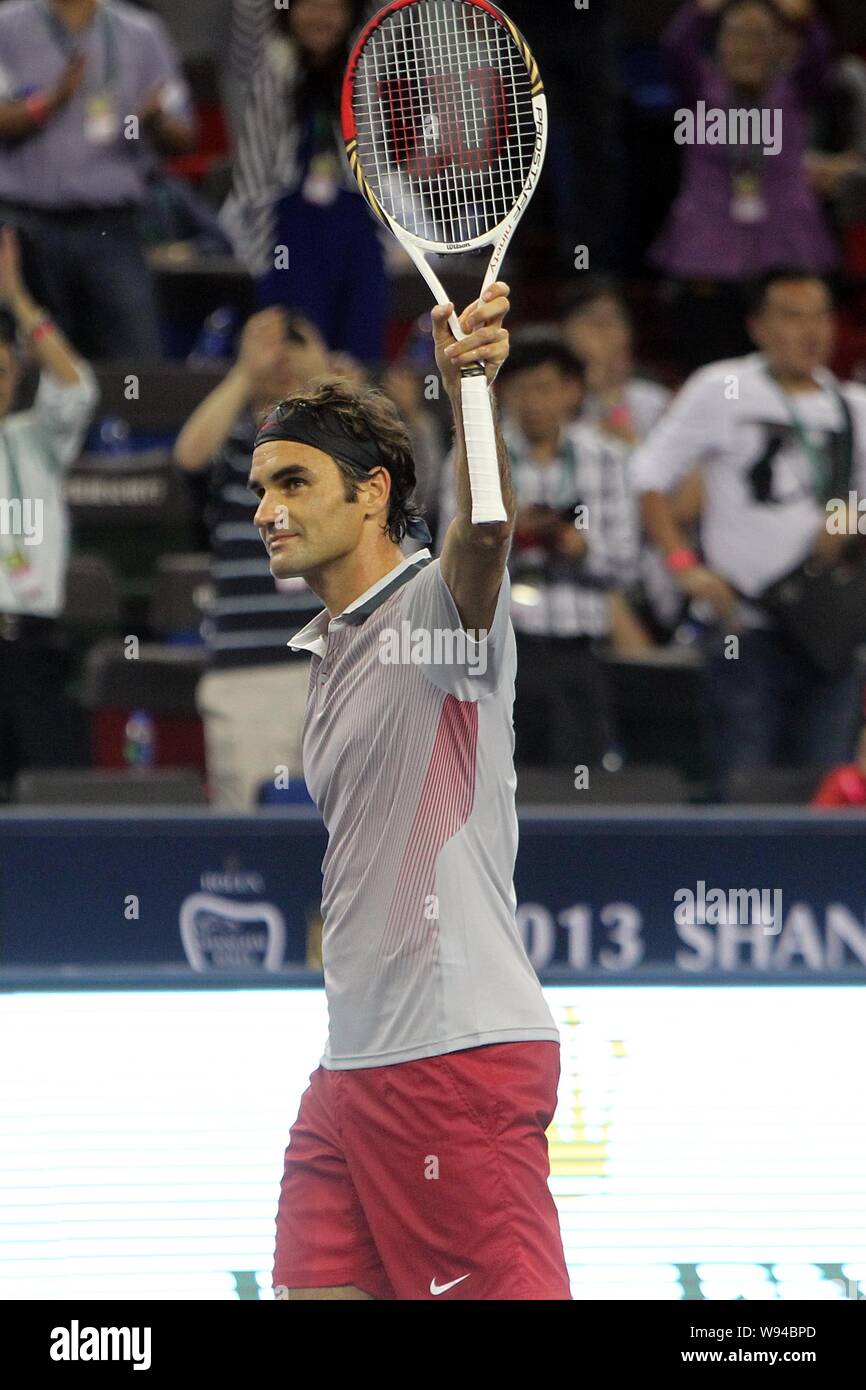 Roger Federer of Switzerland waves after the Shanghai Masters tennis ...