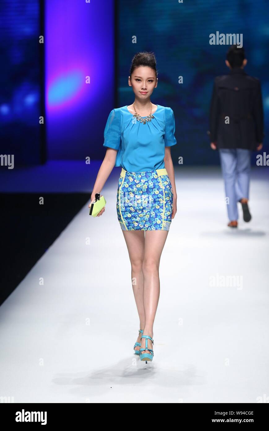 A model displays a new creation at the VISCAP-Yuan Bing fashion show ...