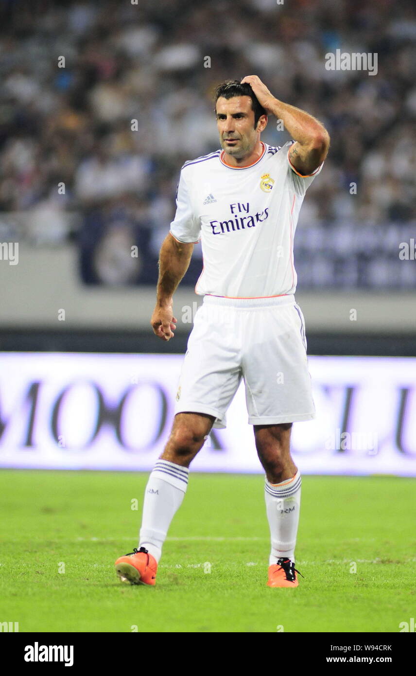 Portuguese football star Luis Figo of Real Madrid Leyendas runs in a ...