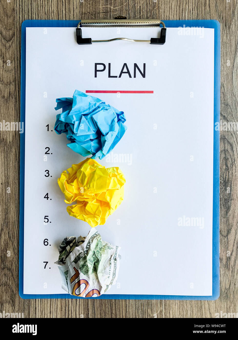 Clipboard with text plan on wood desk Stock Photo - Alamy