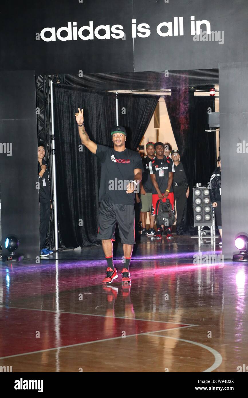 NBA star Derrick Rose of Chicago Bulls poses during a promotional event ...