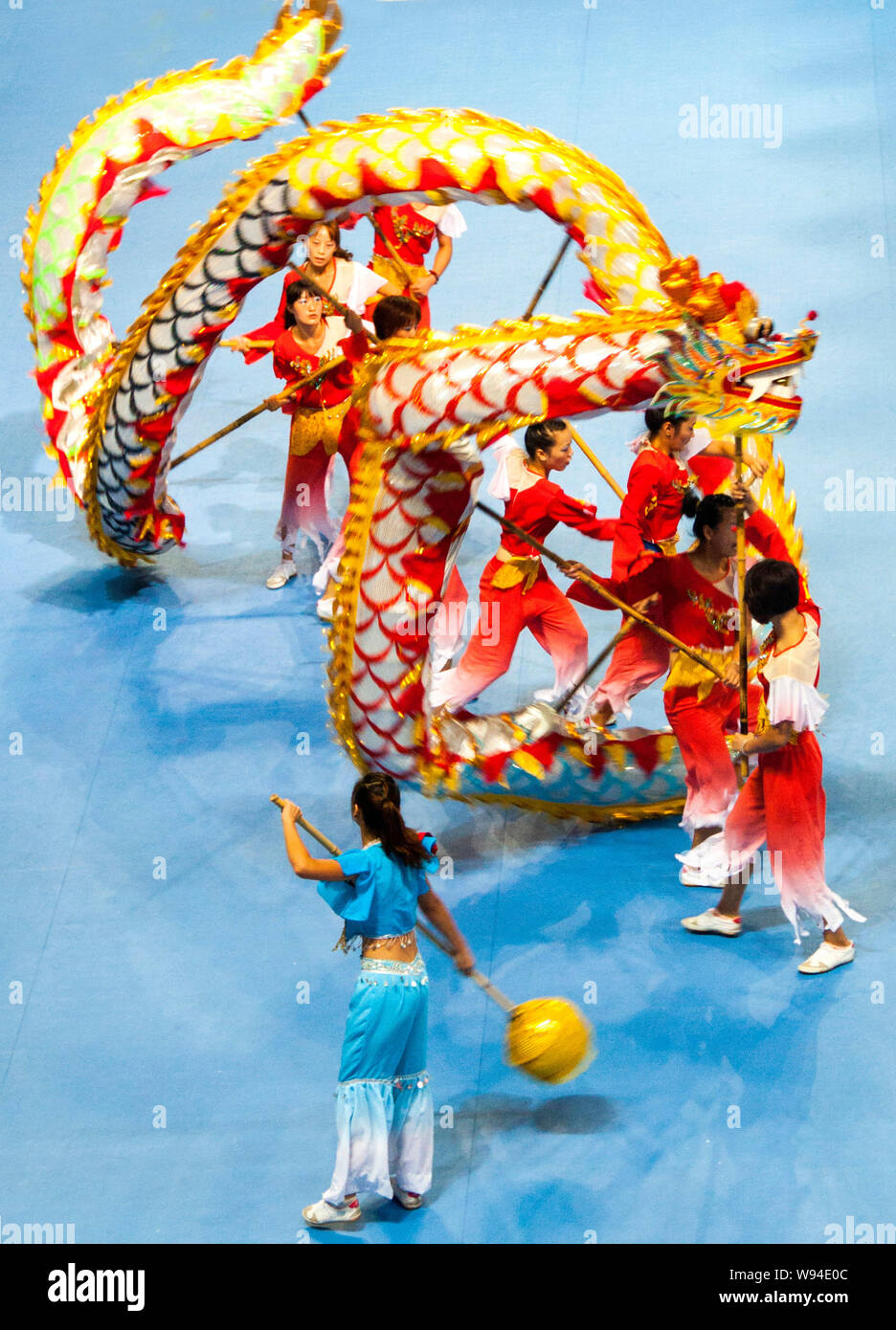 Chinese college students perform dragon dance during the final of 6th ...