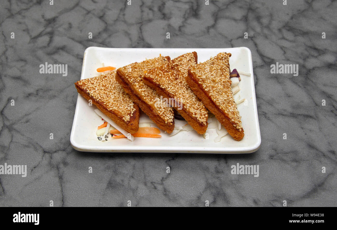 Chinese food. sesame prawn toast Stock Photo - Alamy