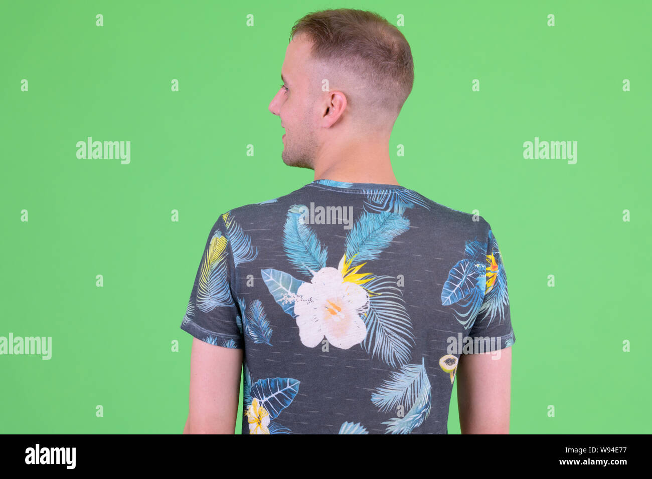 Closeup rear view of man looking over shoulder Stock Photo - Alamy