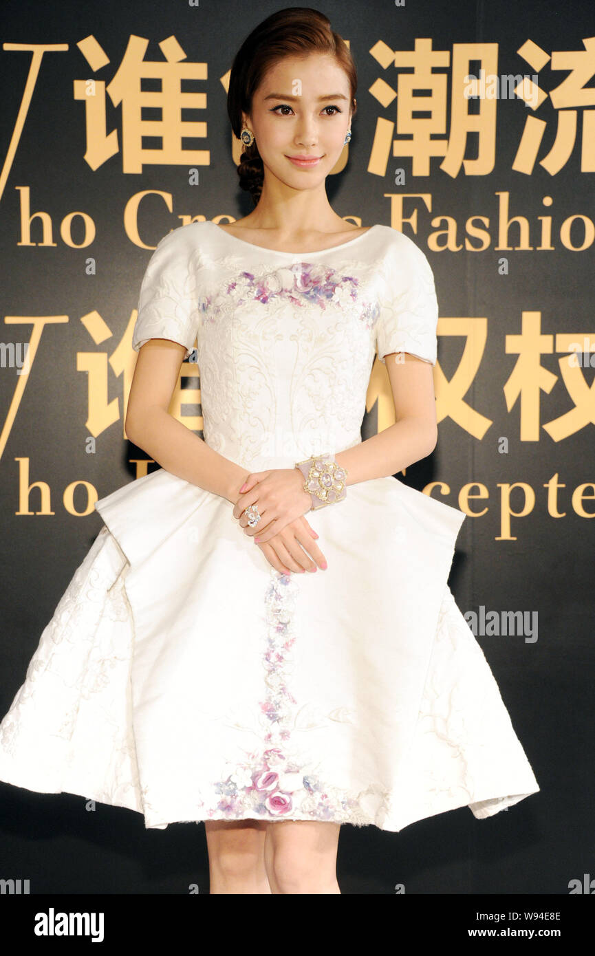 Hong Kong model and actress Angelababy poses as she arrives for the ...