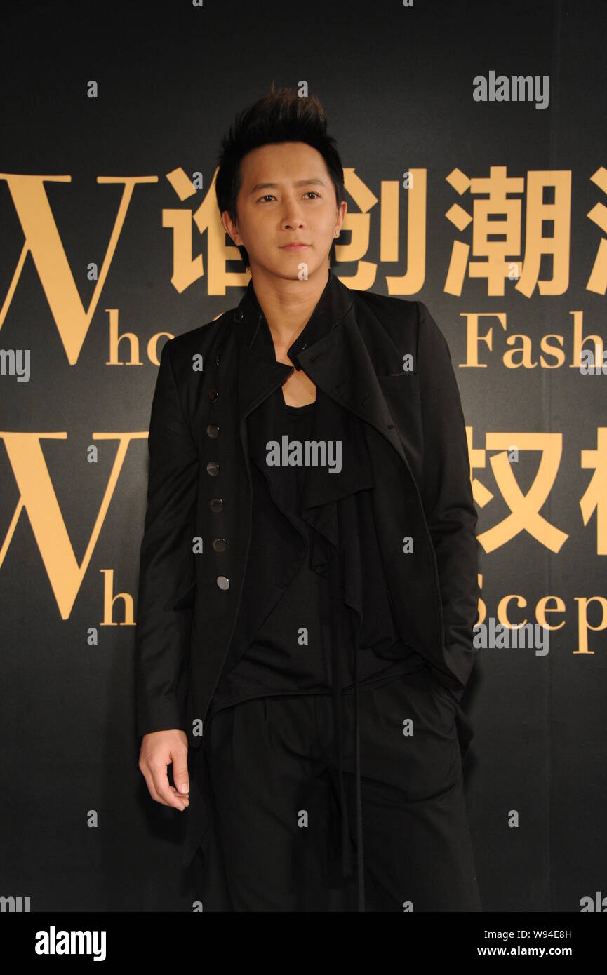 Chinese singer and actor Han Geng poses as he arrives for the 2012 Sohu ...