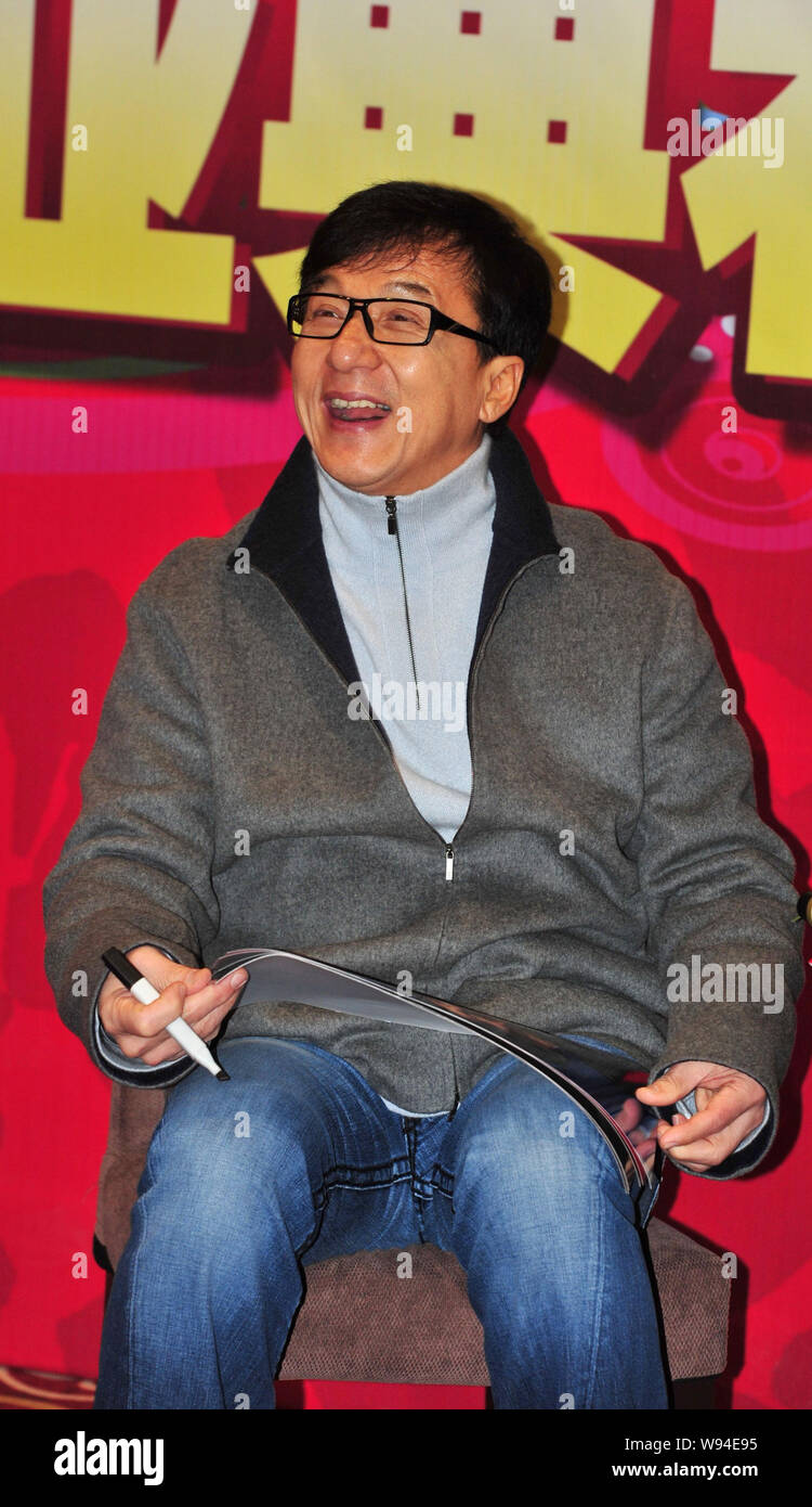 Hong Kong actor Jackie Chan laughs during the opening ceremony for the ...
