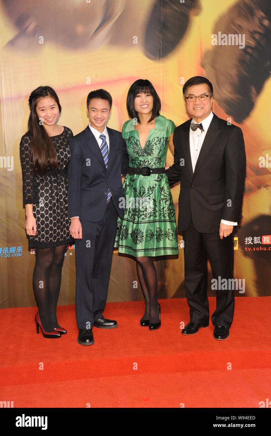 --FILE--U.S. Ambassador to China Gary Locke, right, poses with his ...