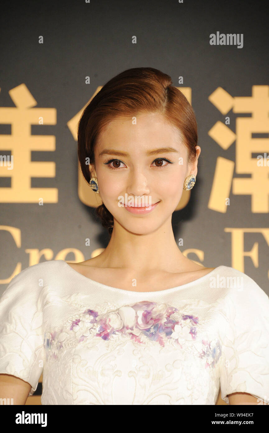 Hong Kong model and actress Angelababy poses as she arrives for the ...