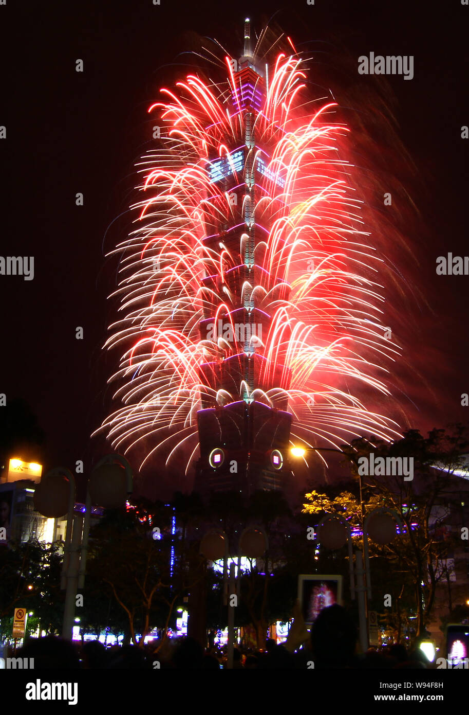 Fireworks explode on the Taipei 101 during a New Year fireworks show ...