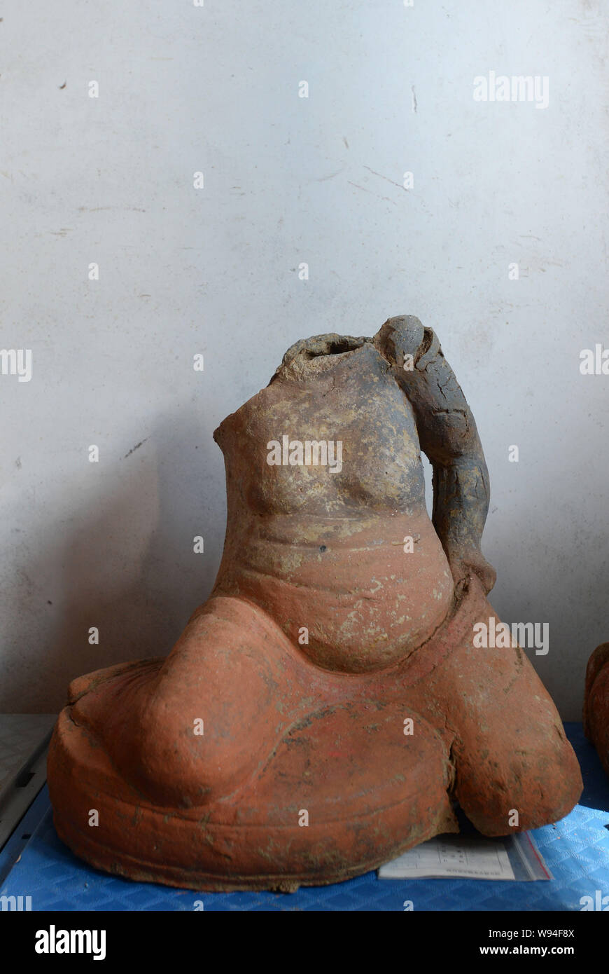 A broken human-shaped pottery ware unearthed from an ancient tomb of ...