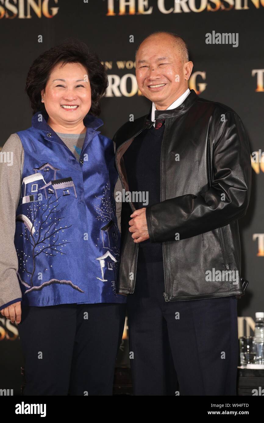 Hong Kong director John Woo, right, and his wife Annie Woo pose during ...