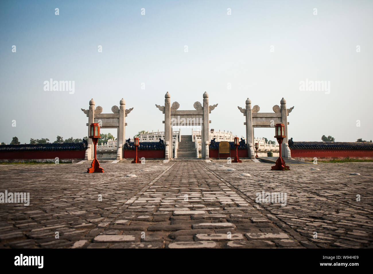 Three traditional gates in a paved courtyard Stock Photo - Alamy