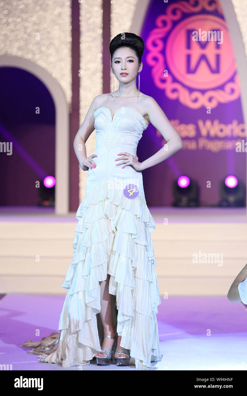 No.4 contestant Wang Qinyun poses during the finale of the 63rd Miss ...