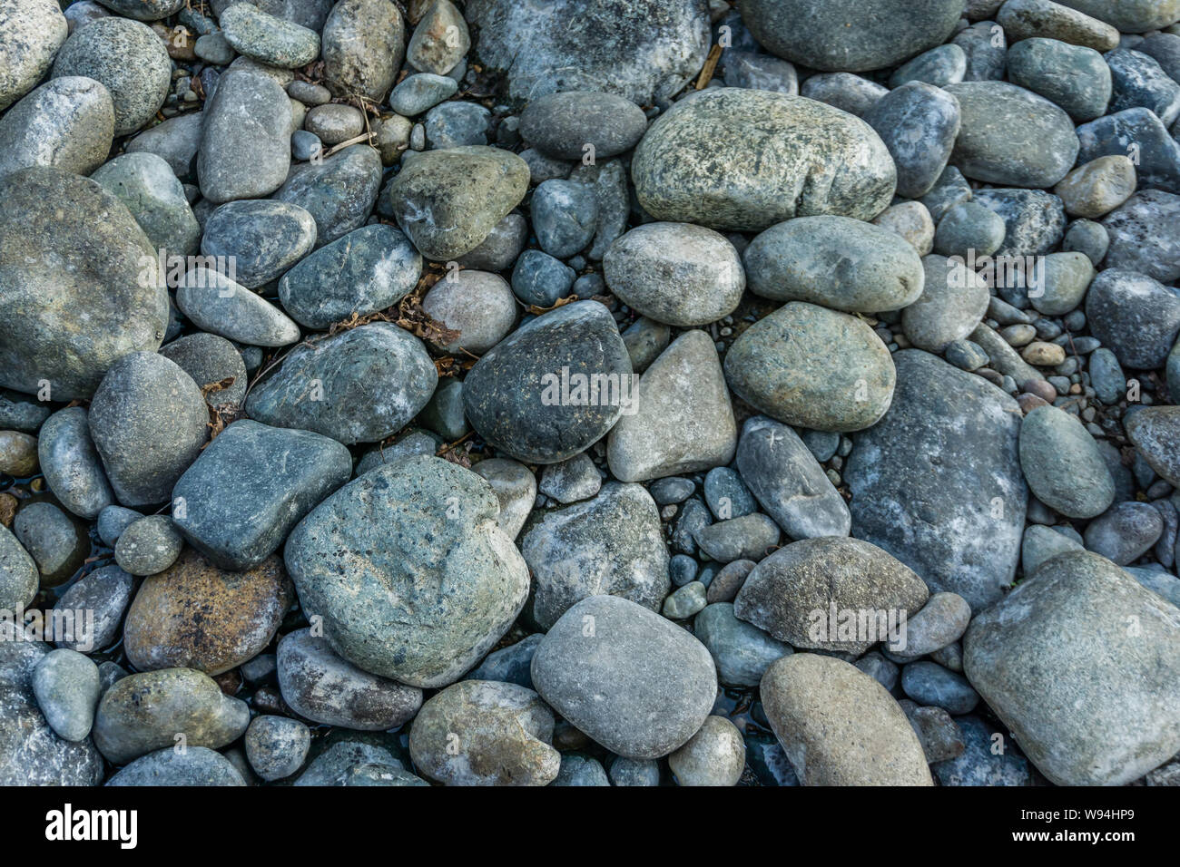 Round river rocks hi-res stock photography and images - Alamy