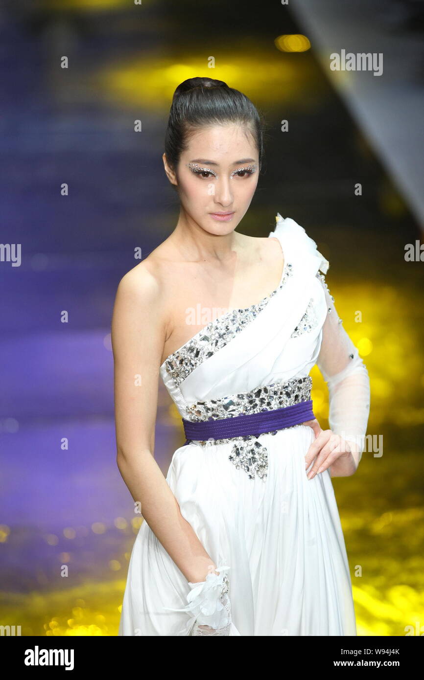 A model displays a new creation by Chinese fashion designer Mark Cheung ...