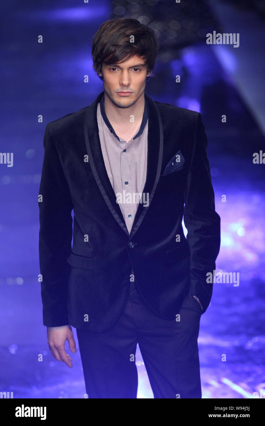 A model displays a new creation by Chinese fashion designer Mark Cheung ...