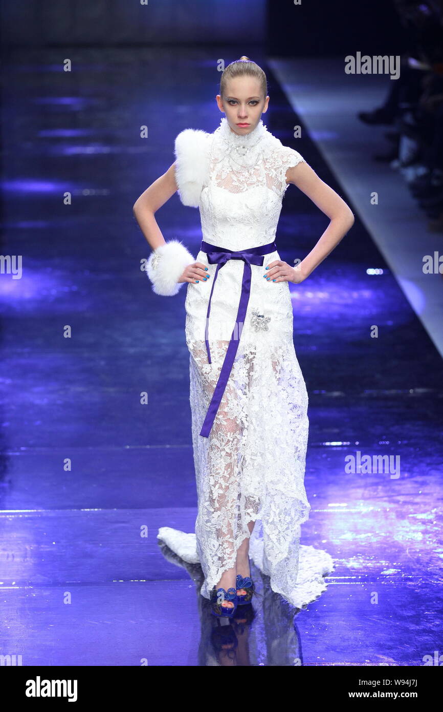 A model displays a new creation by Chinese fashion designer Mark Cheung ...