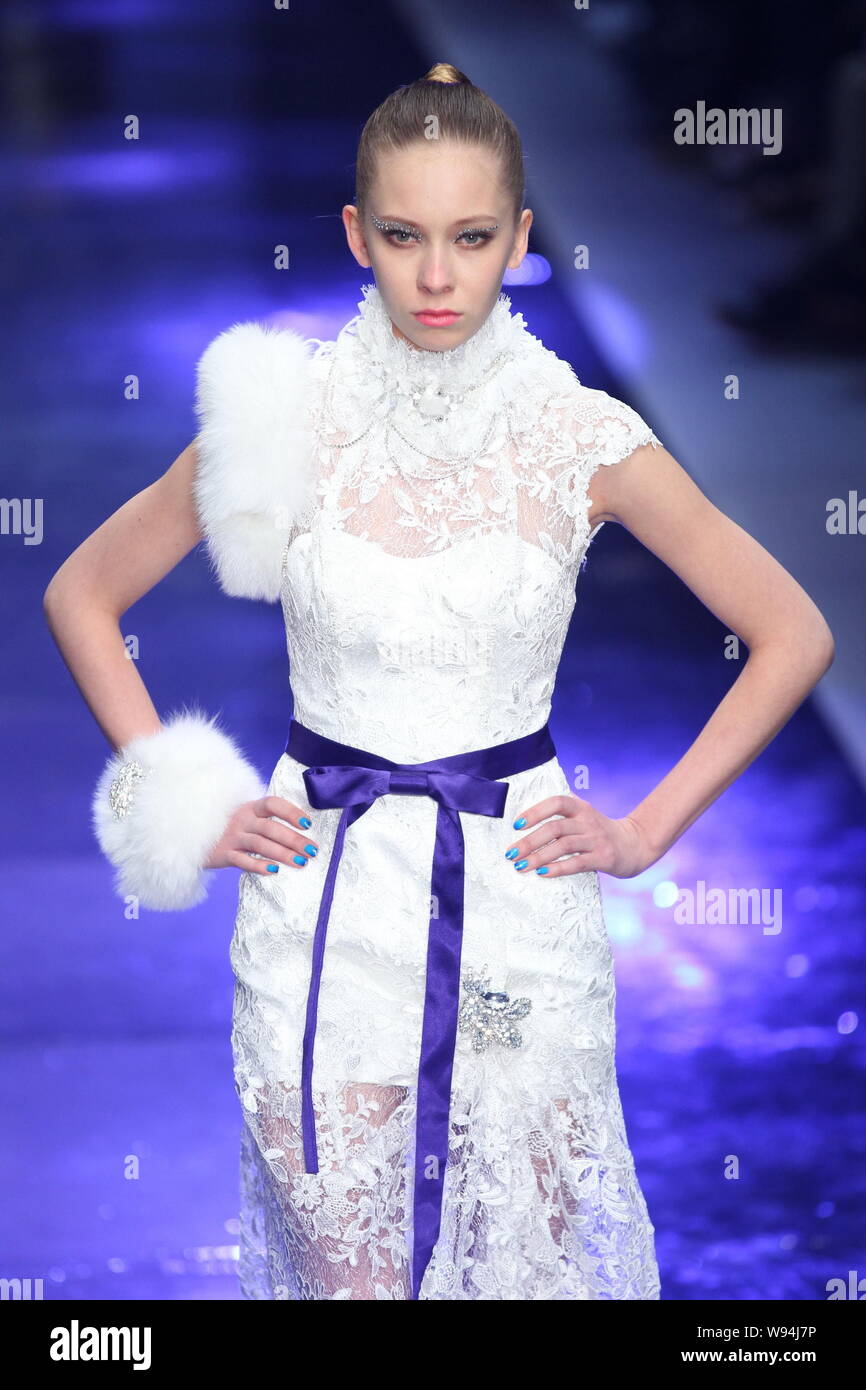 A model displays a new creation by Chinese fashion designer Mark Cheung ...