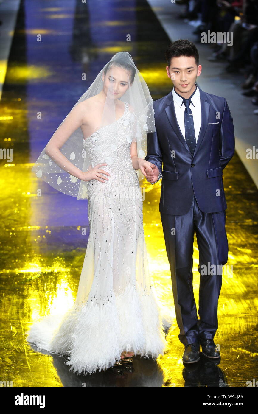 Models display new creations by Chinese fashion designer Mark Cheung in the Mark Alpha Oerma ...