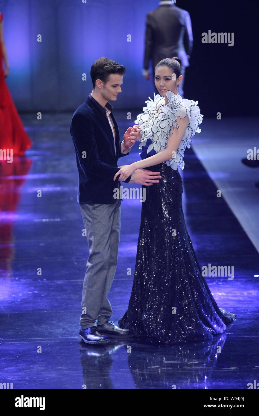 Models display new creations by Chinese fashion designer Mark Cheung in ...