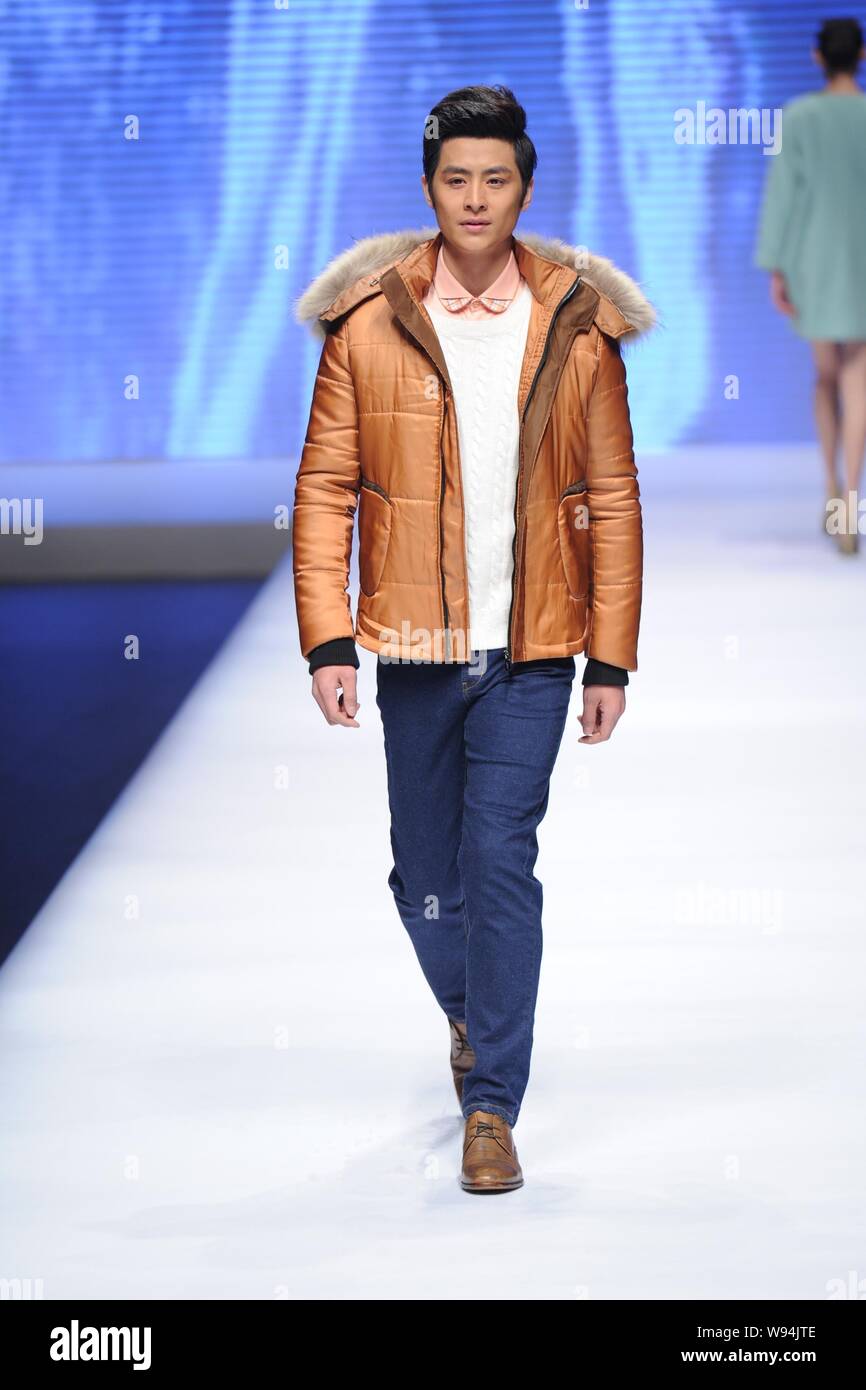 A model displays a new creation by Chinese fashion designer Yuan Bing ...