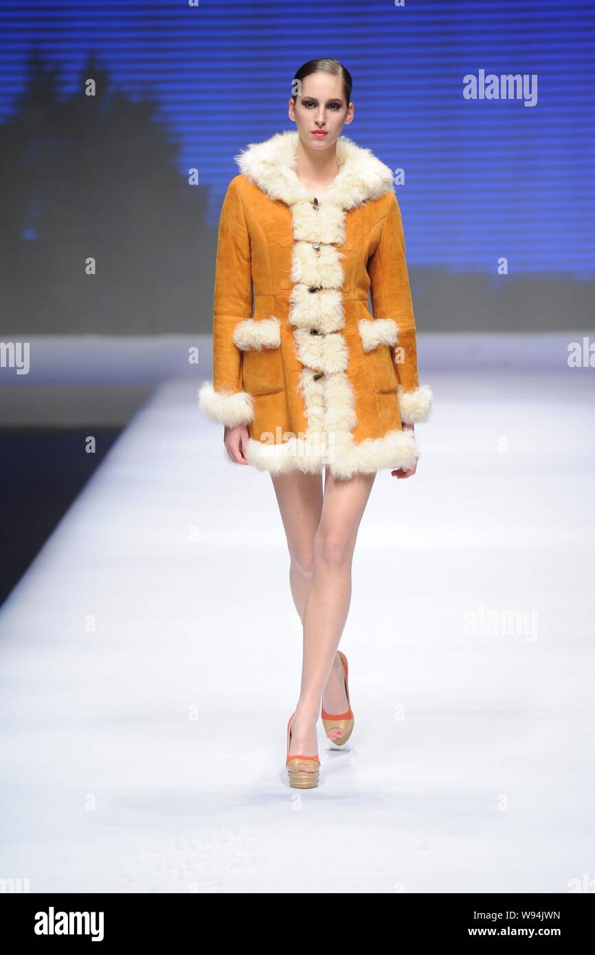 A model displays a new creation by Chinese fashion designer Yuan Bing ...