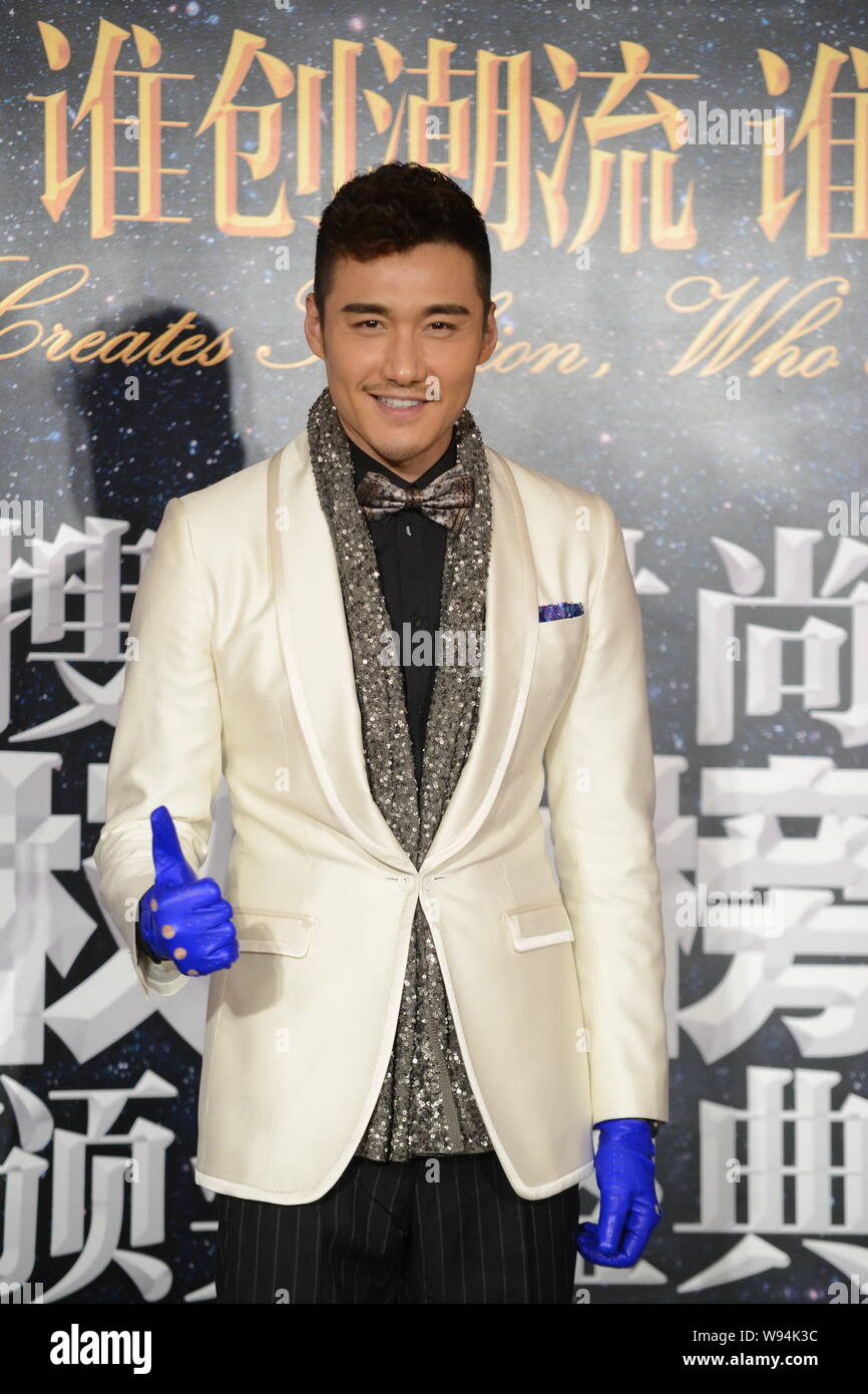 Chinese model, singer and actor Hu Bing poses as he arrives for the ...