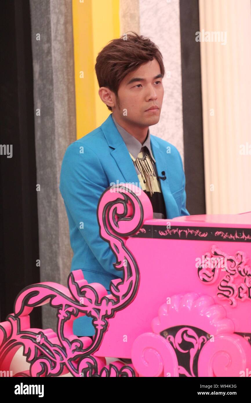 Taiwanese singer and actor Jay Chou performs during a record of TV show ...