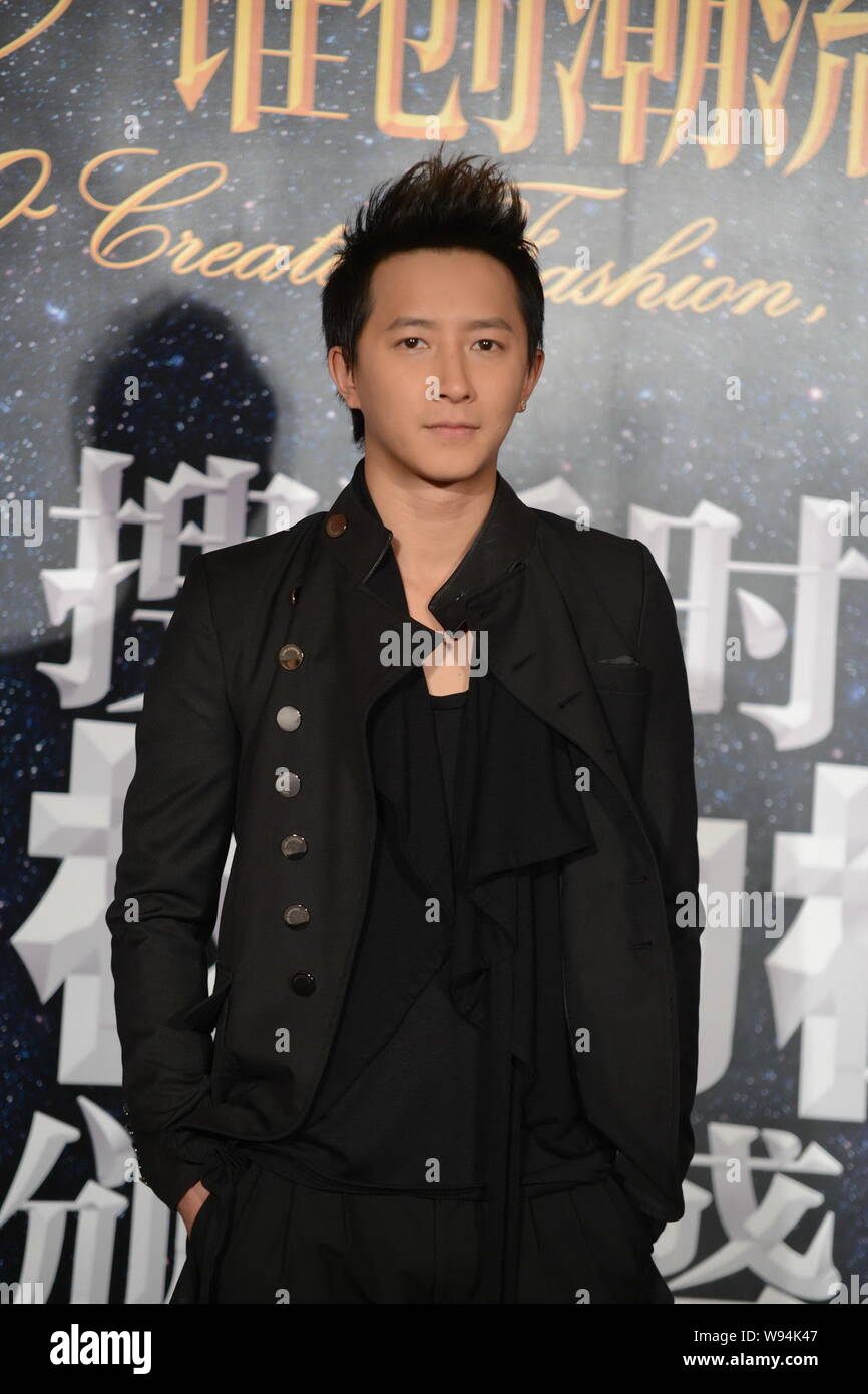Chinese singer and actor Han Geng poses as he arrives for the 2012 Sohu ...