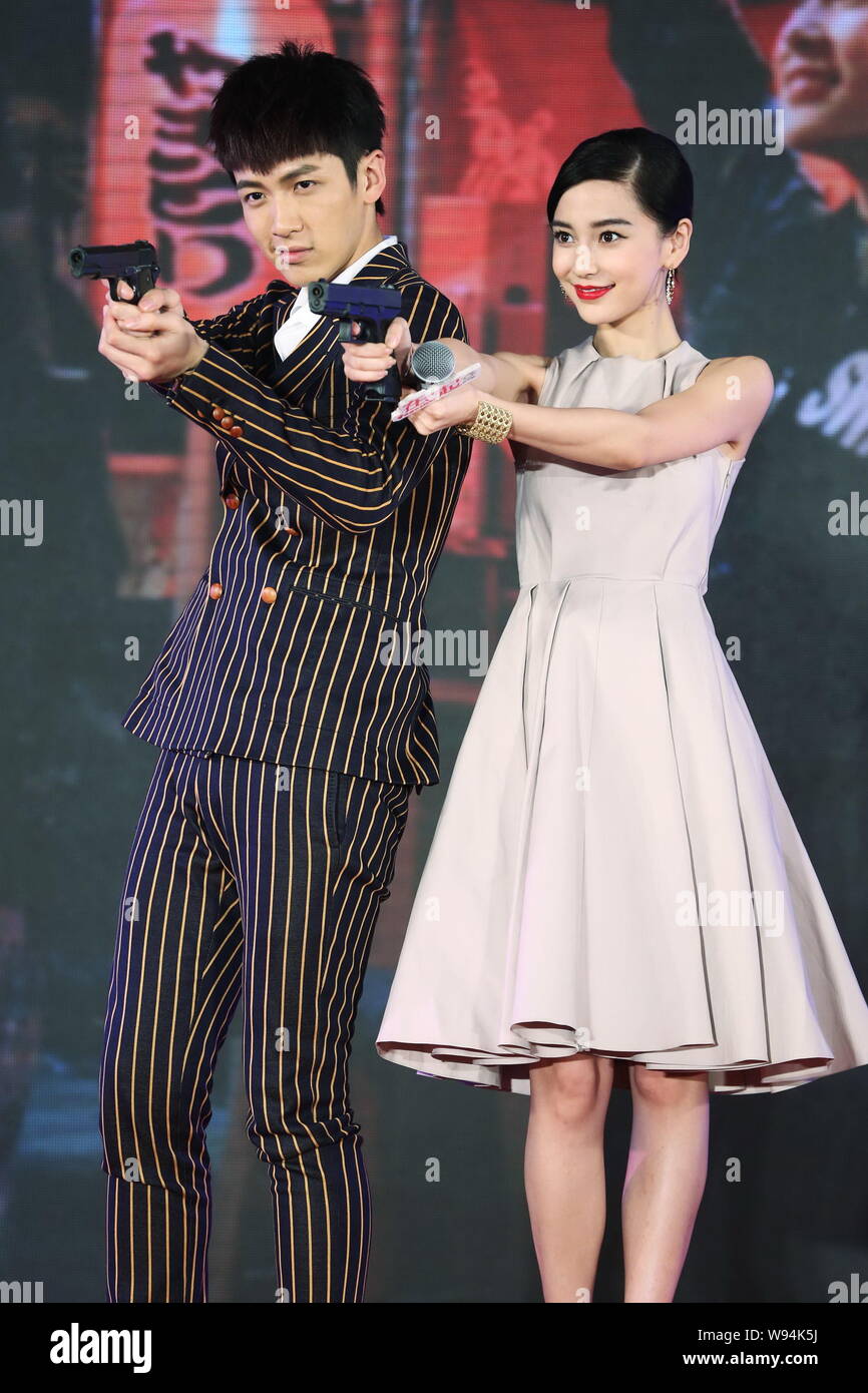Hong Kong model and actress Angelababy, right, and Taiwanese actor Kai Ko pose during the ...