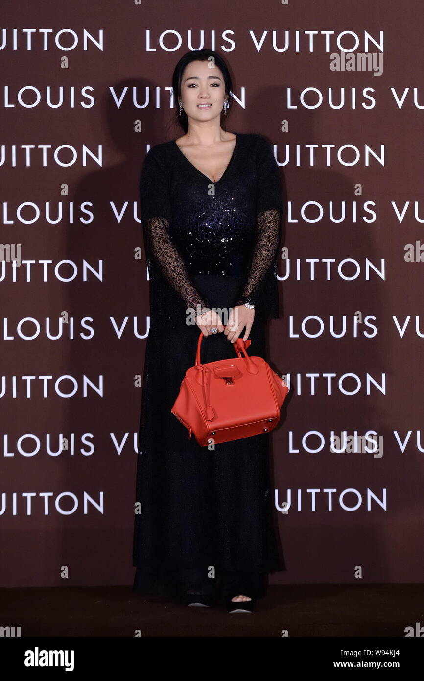 Chinese actress Gong Li poses during the opening ceremony for the new ...