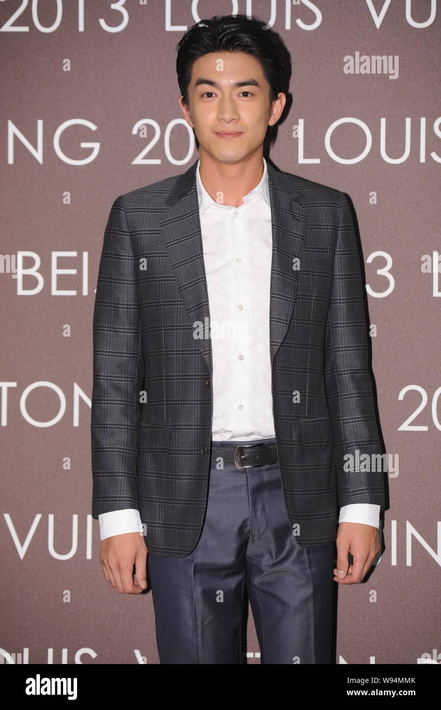 Chinese actor Kenny Lin Gengxing poses as he arrives at the opening ...
