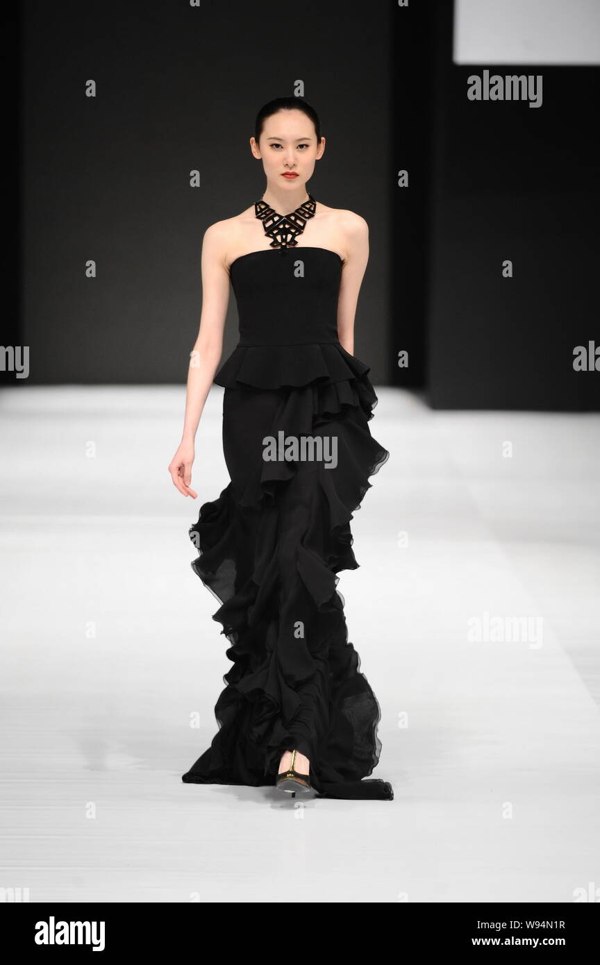 A model displays a new creation by Chinese fashion desinger Frankie Xie in the JEFEN fashion ...