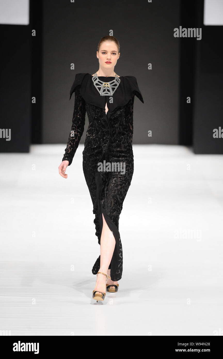 A model displays a new creation by Chinese fashion desinger Frankie Xie in the JEFEN fashion ...