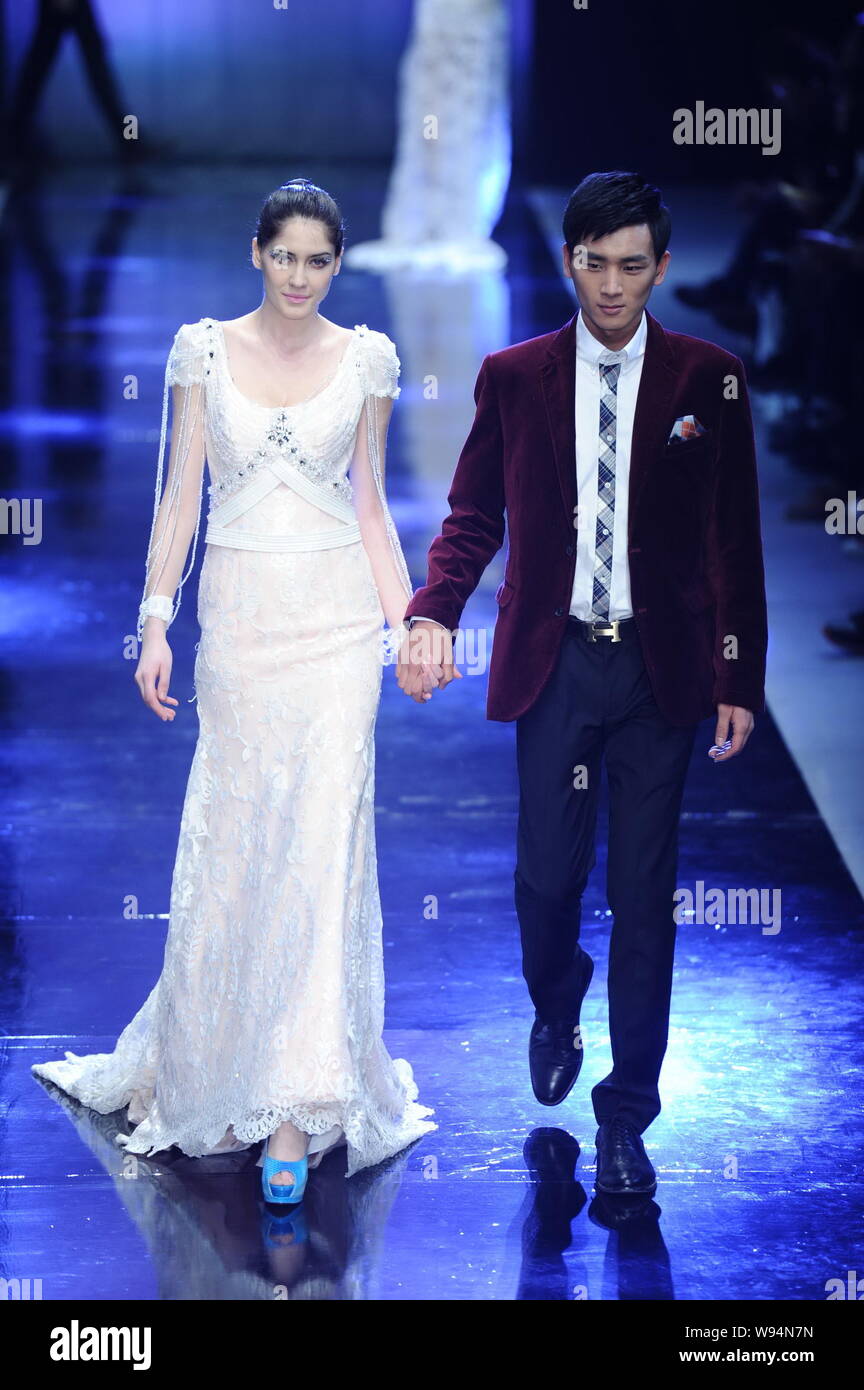 Models display new creations by Chinese fashion designer Mark Cheung in the Mark Alpha Oerma ...